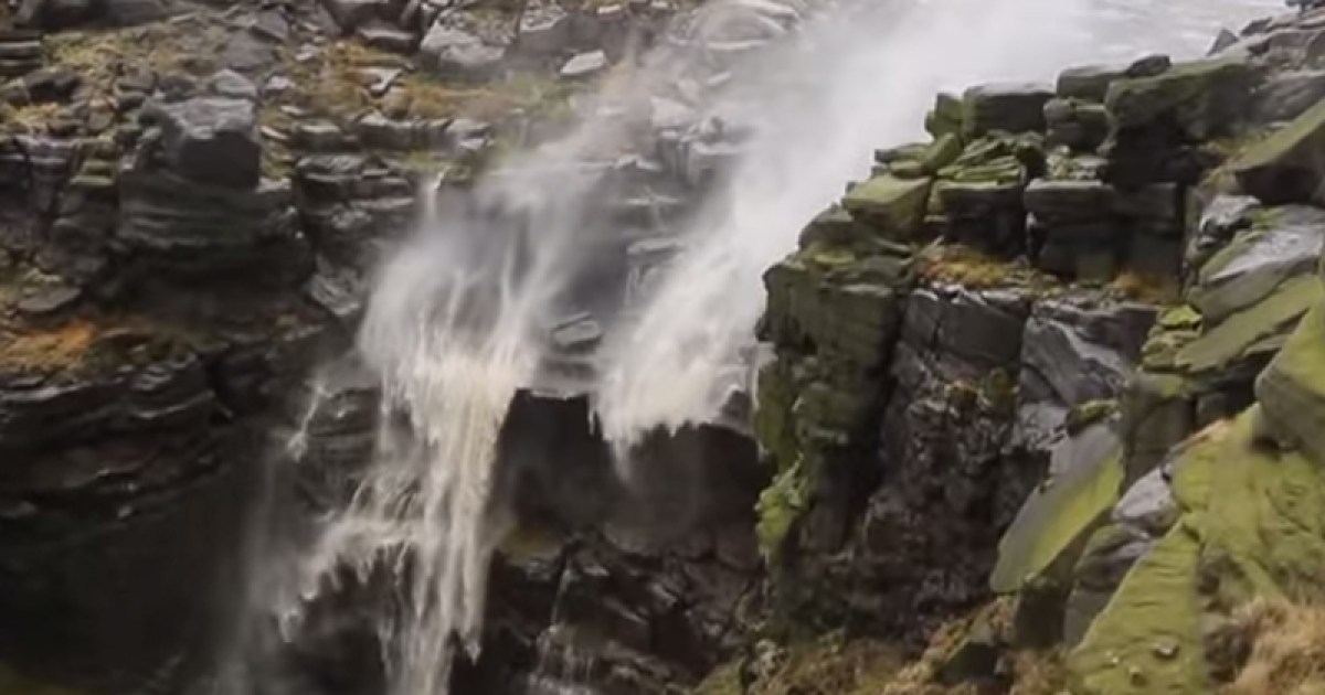 Backwards waterfall flows uphill at Kinder Downfall | The New Daily