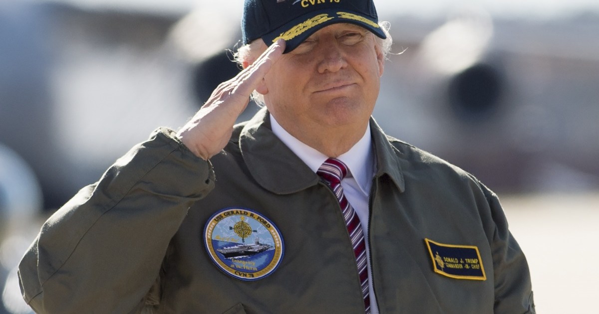 Donald Trump pilloried for wearing admiral's cap, flight jacket