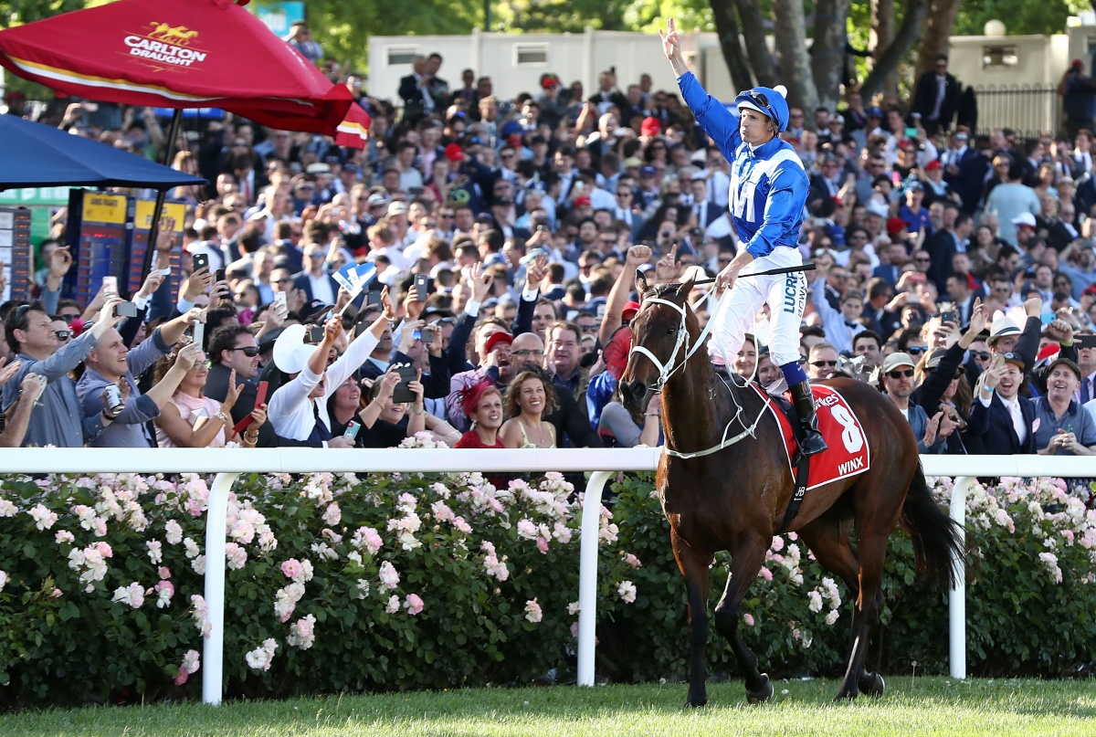 Winx storms to historic third consecutive Cox Plate win