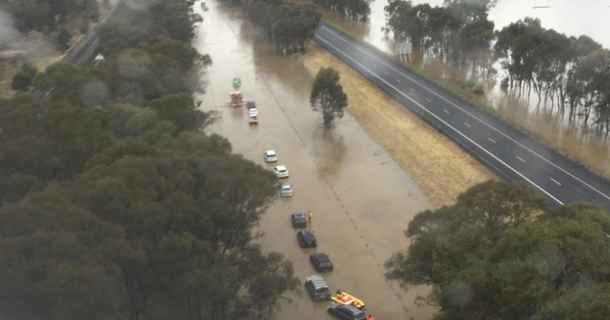 Drivers airlifted to safety as freak rain closes freeway | The New Daily