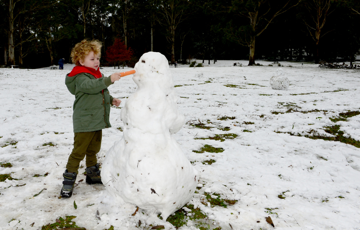 Rain, chilly winds and even snow as early winter blast moves in