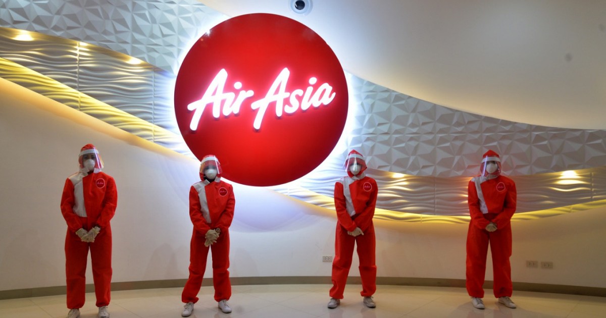 AirAsia introduces red-hot PPE suits for cabin crews