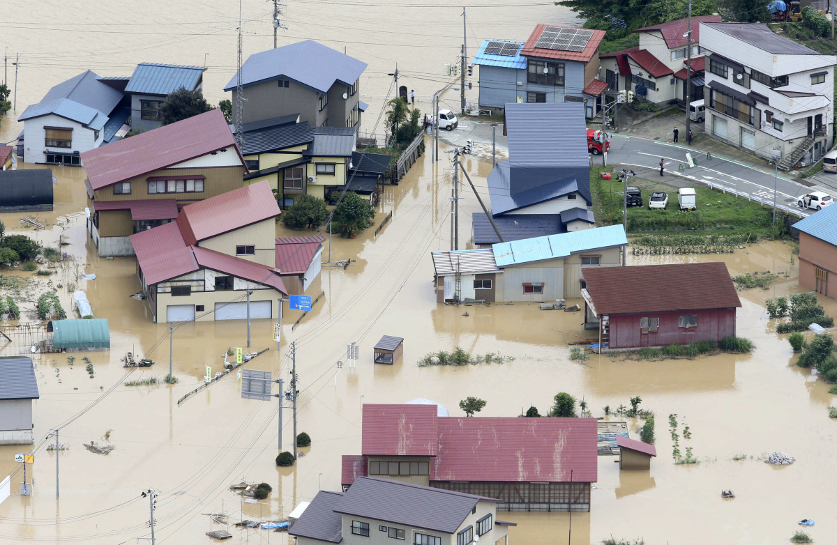 Thousands told to evacuate as record rain causes mass floods in Japan