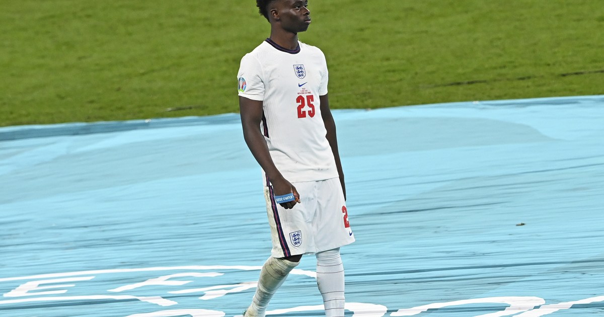 Four arrested over racist attacks against England football trio