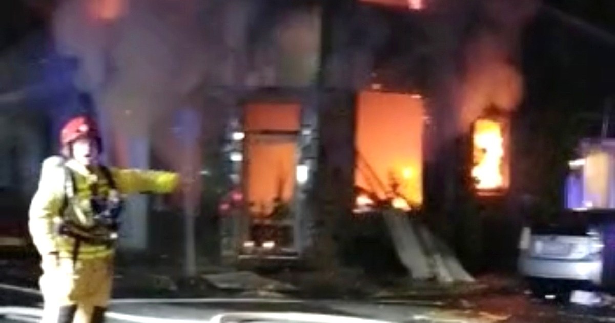 Man faces three murder charges over boarding house fire