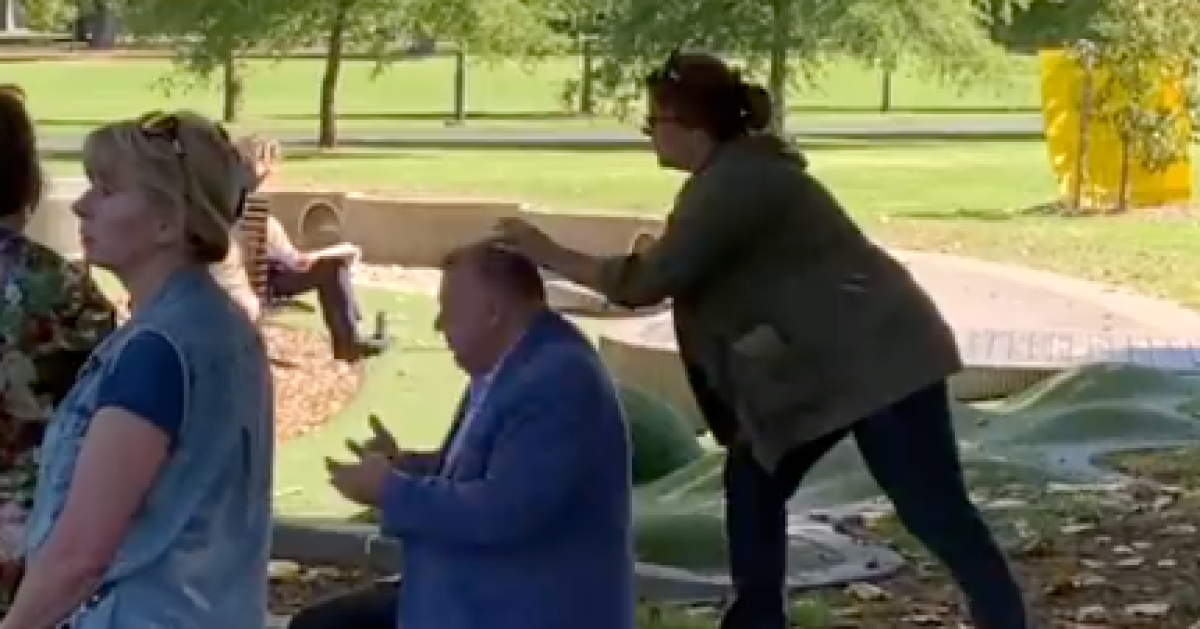Craig Kelly egged by angry woman at Melbourne gathering
