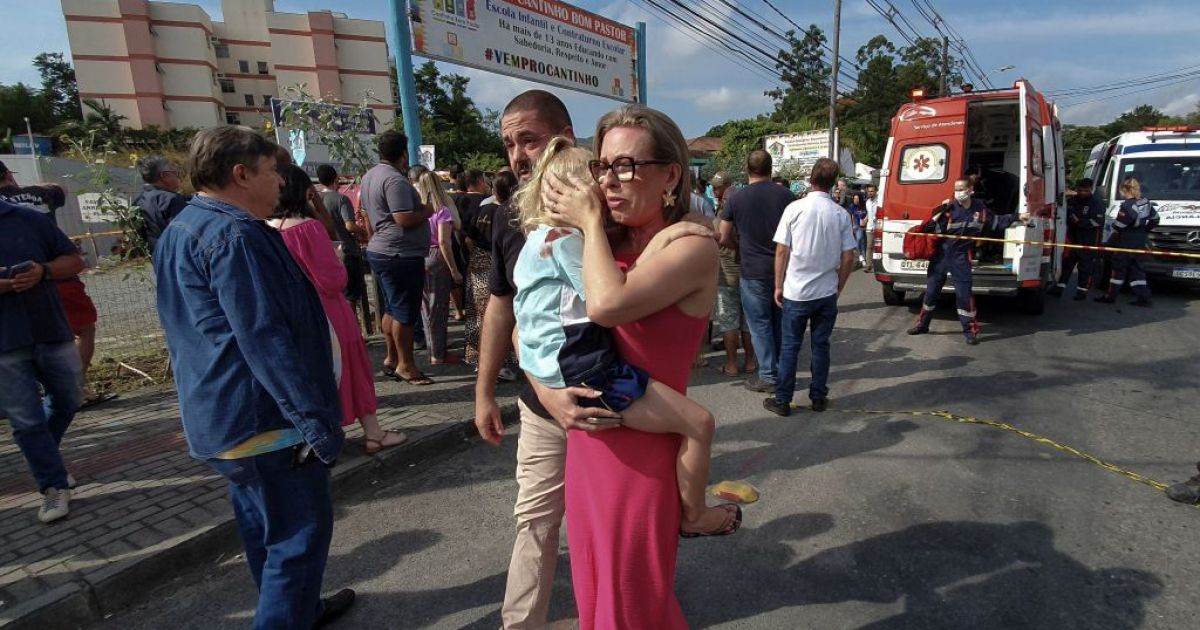 Axe-wielding man scales wall in kindergarten massacre