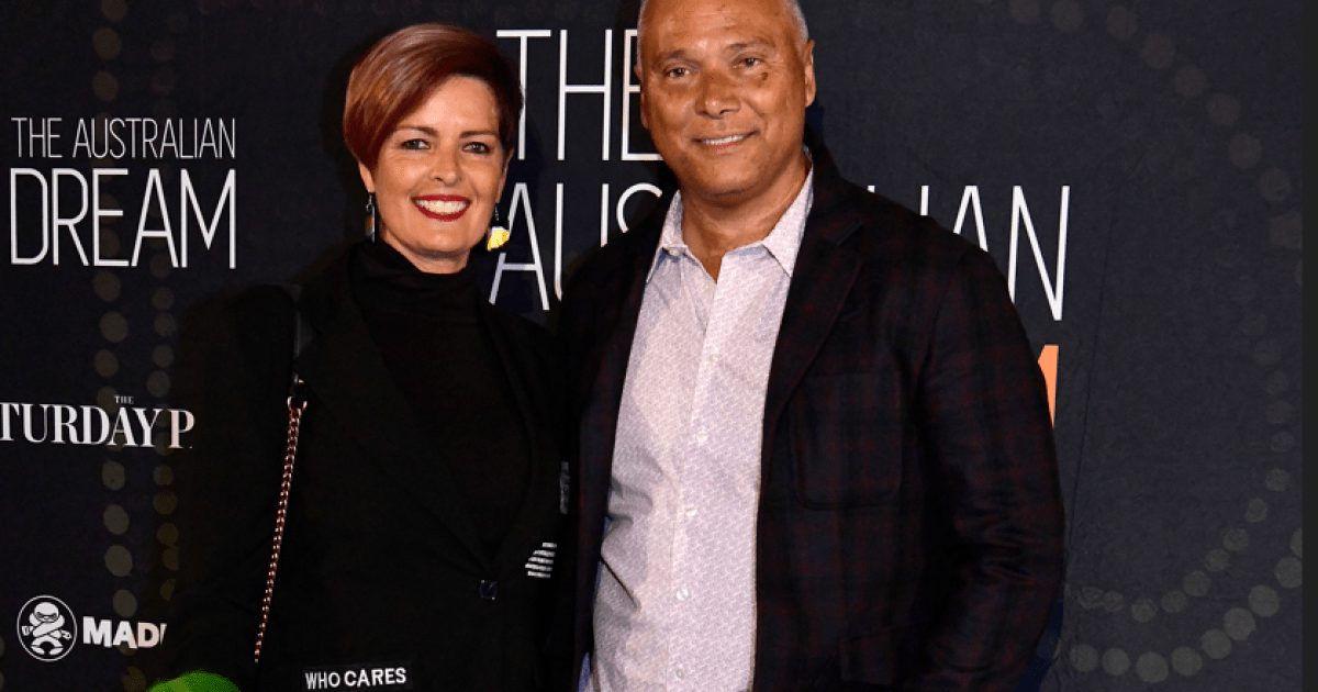 Tracey Holmes follows hubby Stan Grant out the door at the ABC