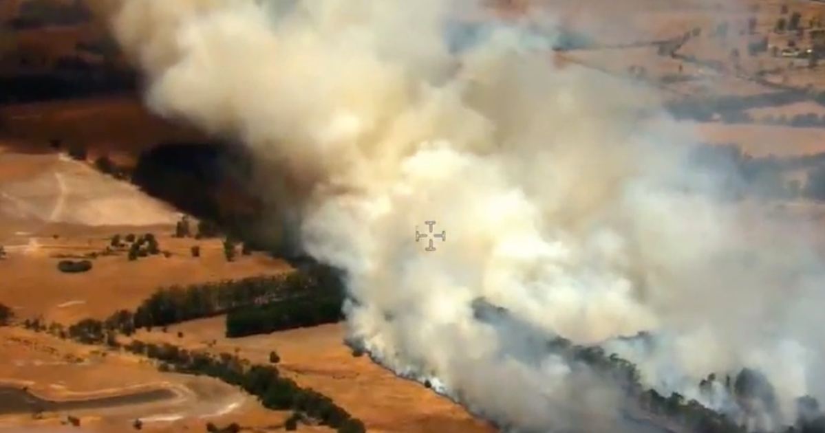 Strong winds fanning bushfire south of Perth