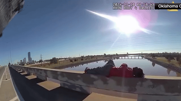 Top Videos: A bridge save, wild storms and a goanna arrest