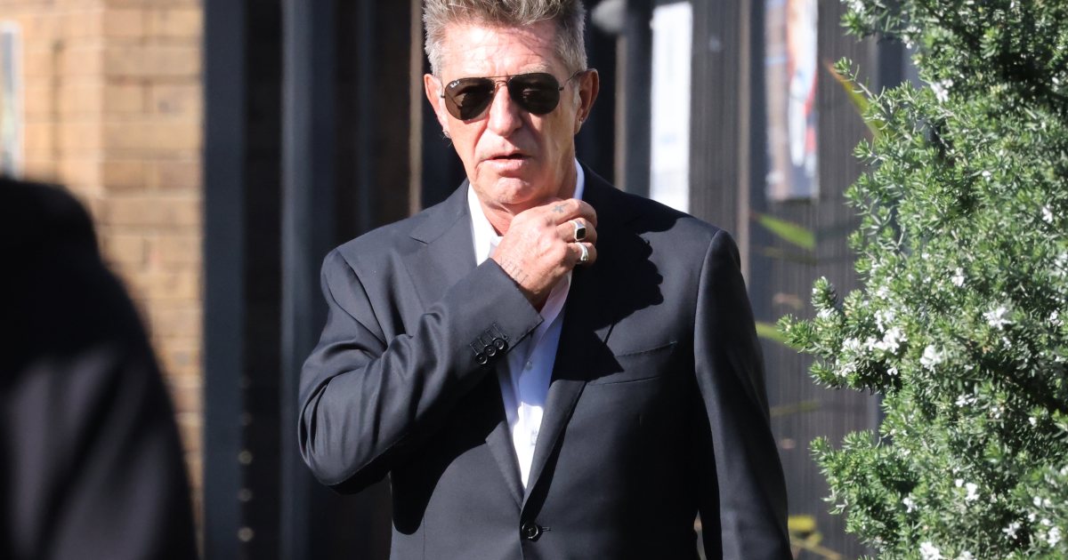 Designer Wayne Cooper to fight charge of wife assault