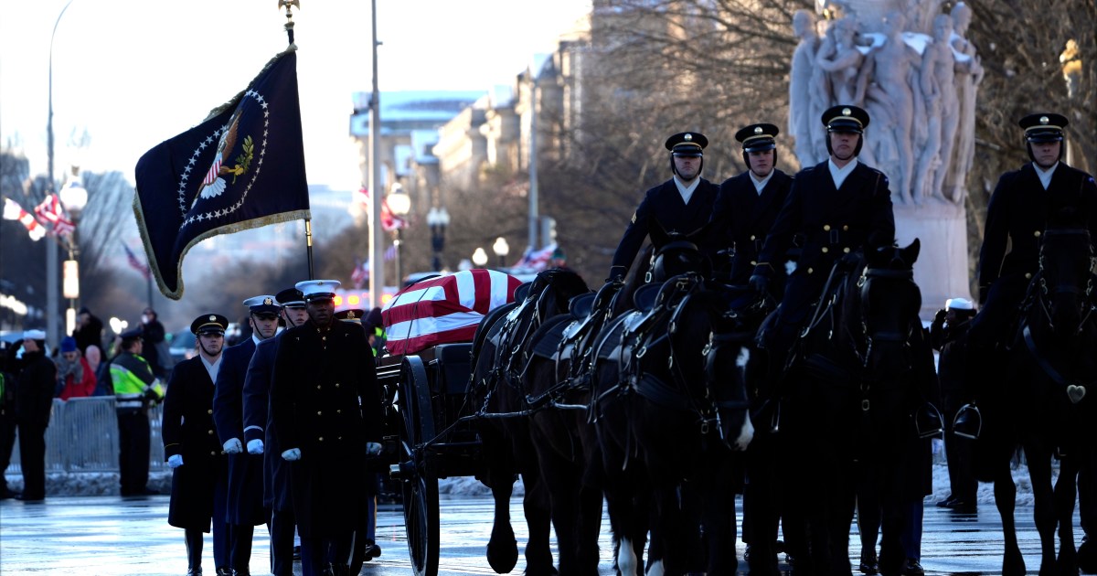 Jimmy Carter's body arrives in Washington for honours