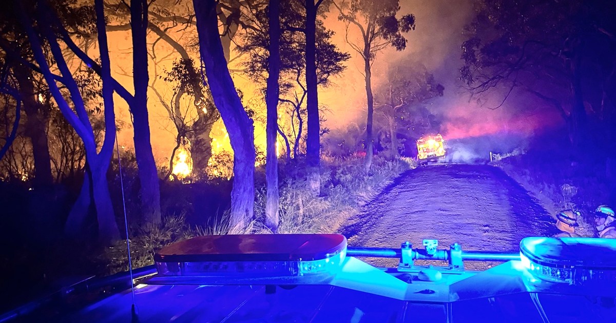 Bushfire under control, but people told not to return