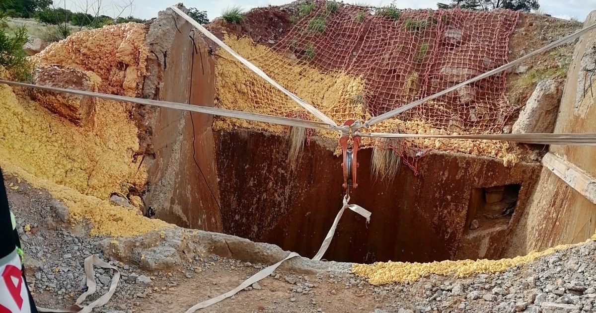 At least 100 miners dead, trapped in South Africa mine