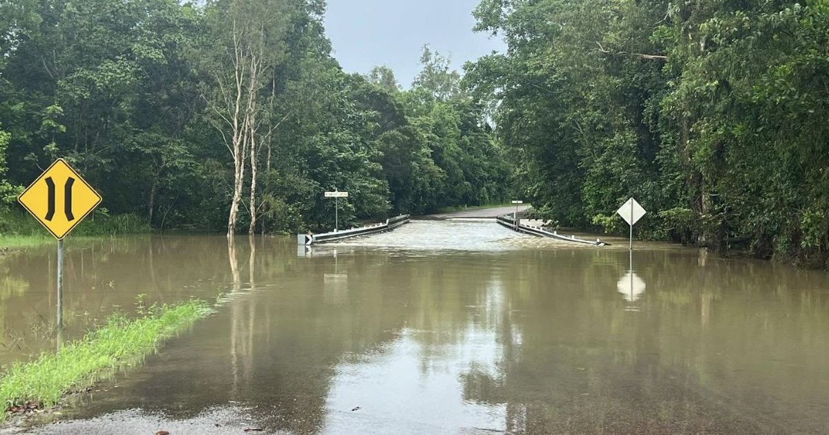 Community warned of flooding as river breaks banks
