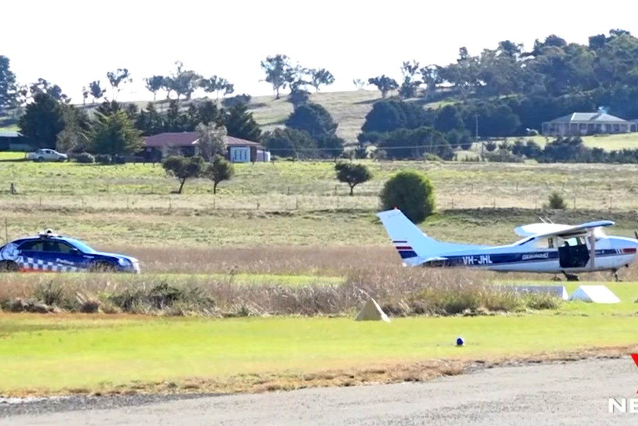 Friend saw men hanging from plane amid skydive 'chaos'