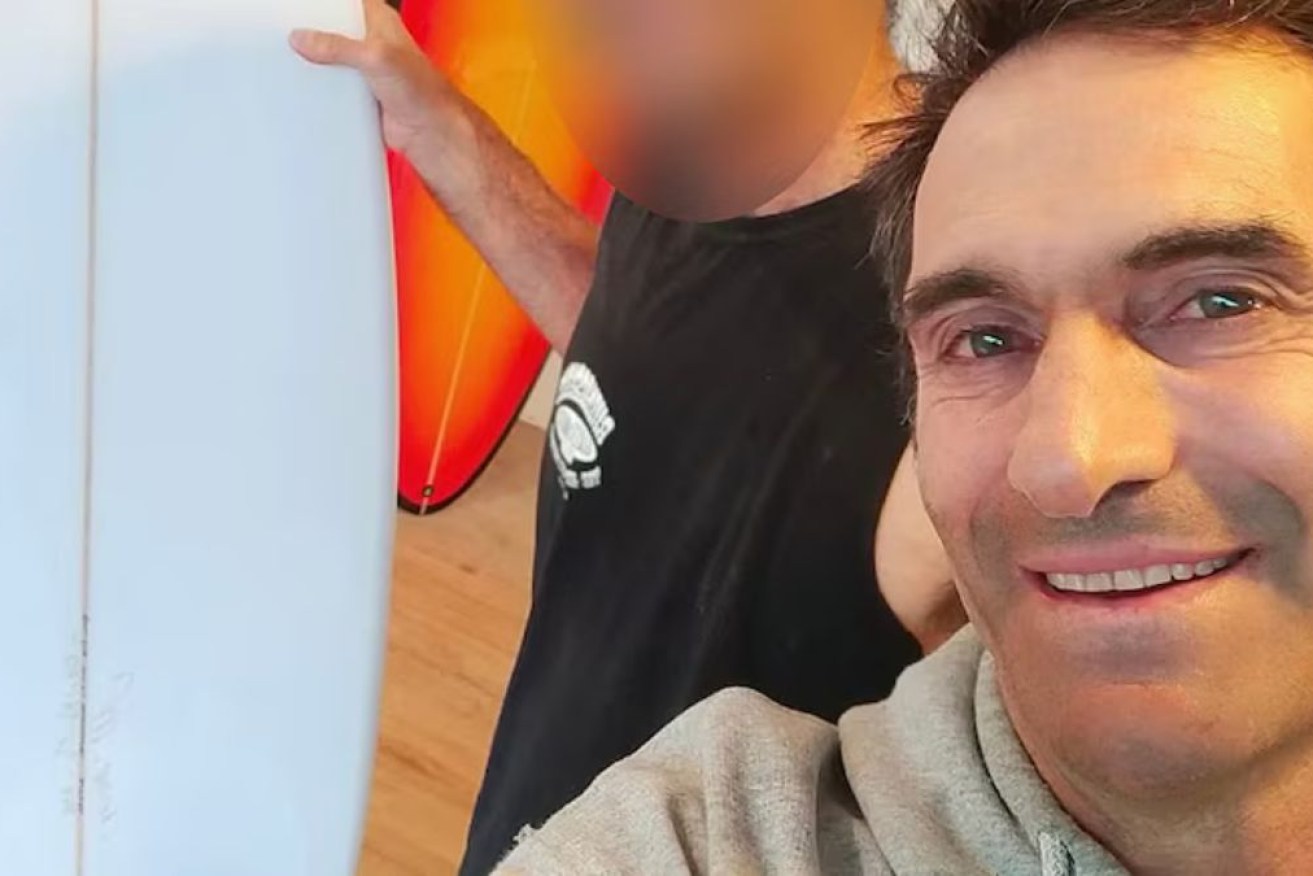 Beloved shark attack victim mourned as net trial paused