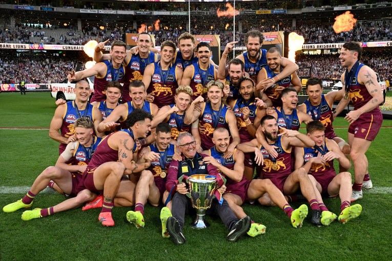 Jubilant AFL fans pack the streets for finals parade