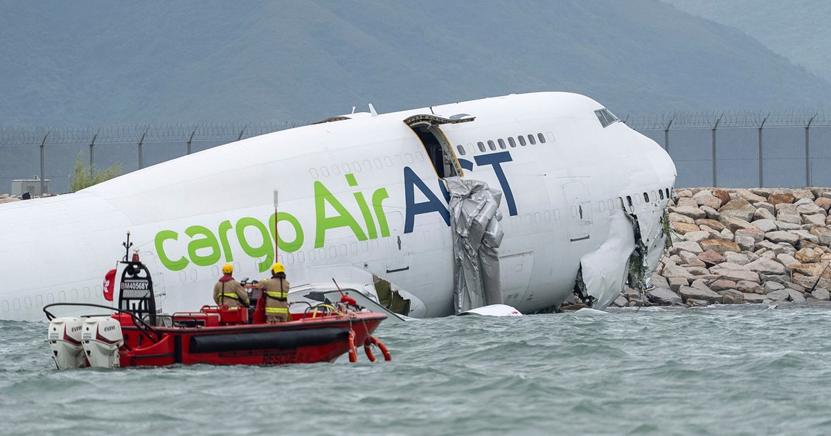 Two dead after cargo plane skids off runway